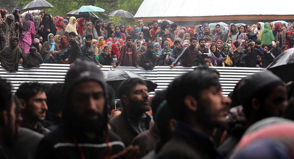 In Pictures: Thousands attend funeral of top militant commander Zakir ...