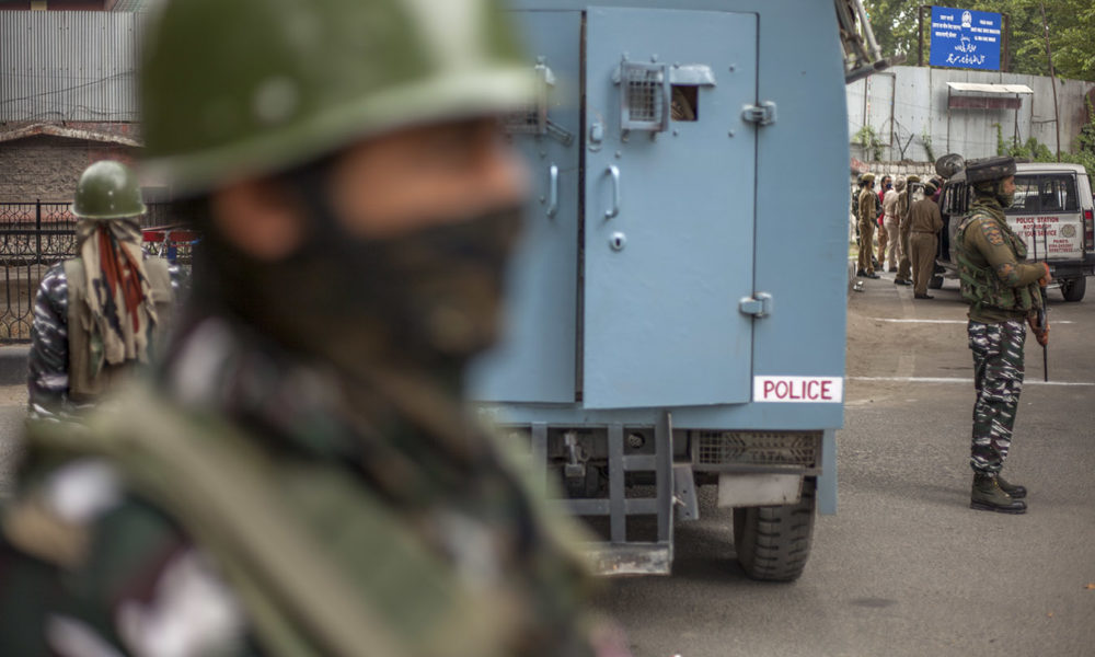 Kashmiri militant Sameer Tiger poses with an American M4 rifle, picture ...